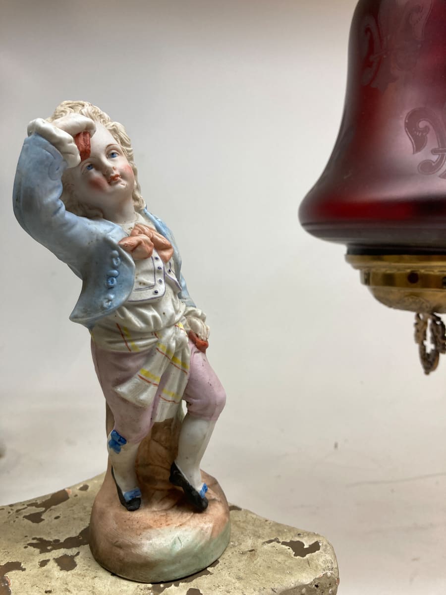Hand painted porcelain bisque boy figure from the collection of ...