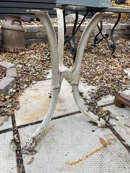 Iron three legged table base from the collection of TIMELINES ANTIQUES ...