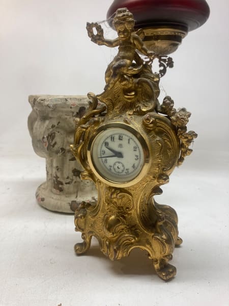 Ornate turn of the century metal clock from the collection of TIMELINES ...